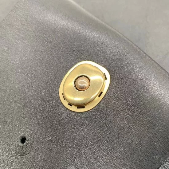 Solid brass, tortoise shell, snap, hardware